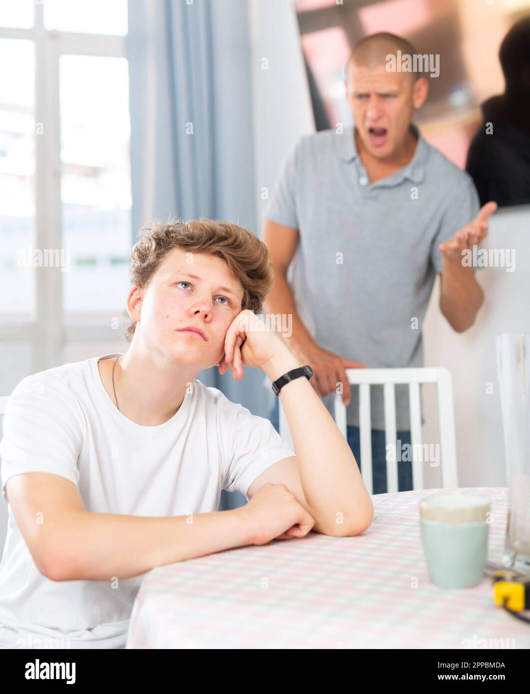 Dad shouting at his son Stock Photo - Alamy