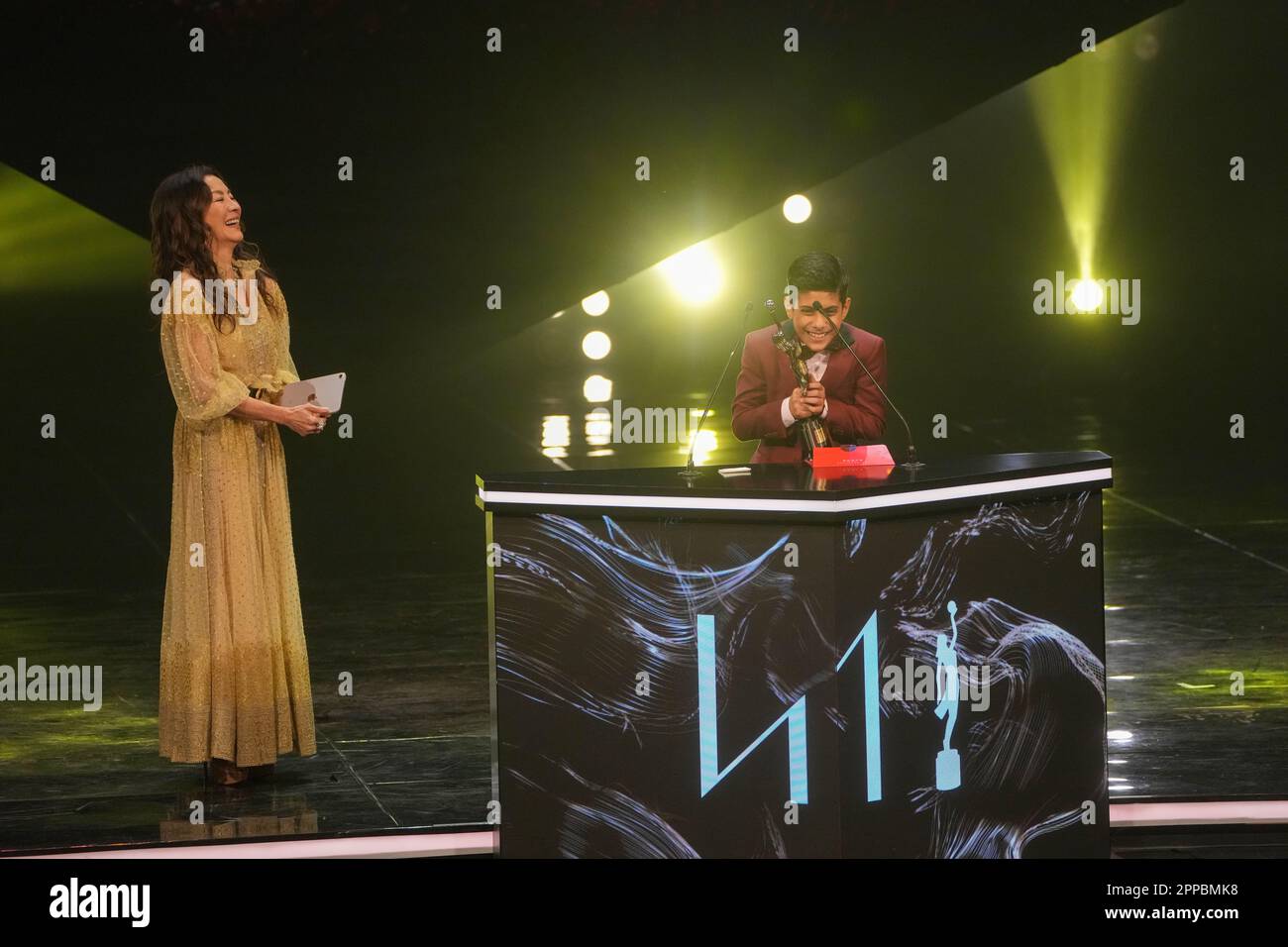 Actress Michelle Yeoh Choo-Kheng reacts after handing Best New ...