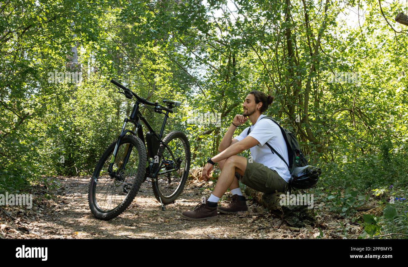 Man riding bicycle in nature hi-res stock photography and images - Alamy