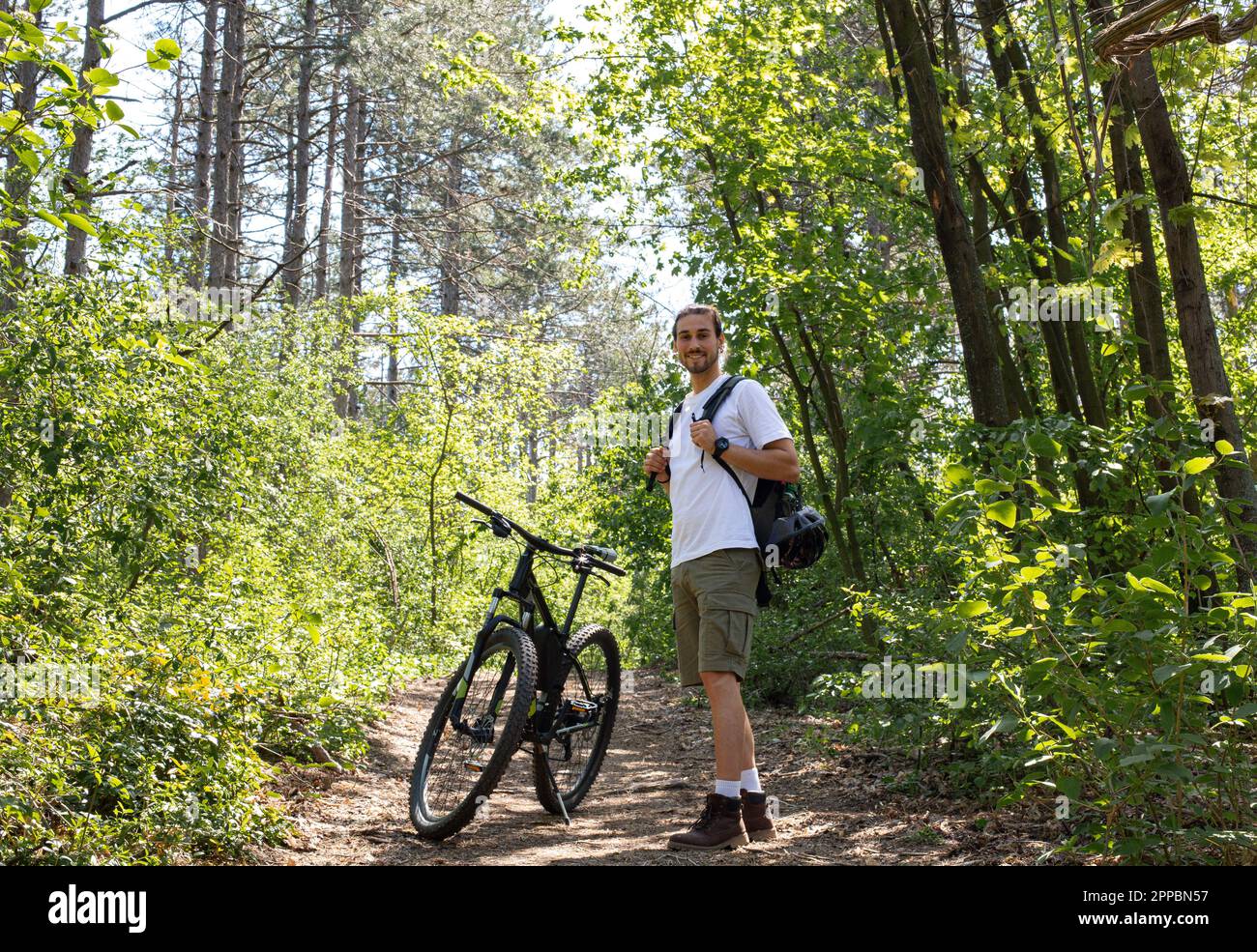 Man bicycle forest hi-res stock photography and images - Alamy