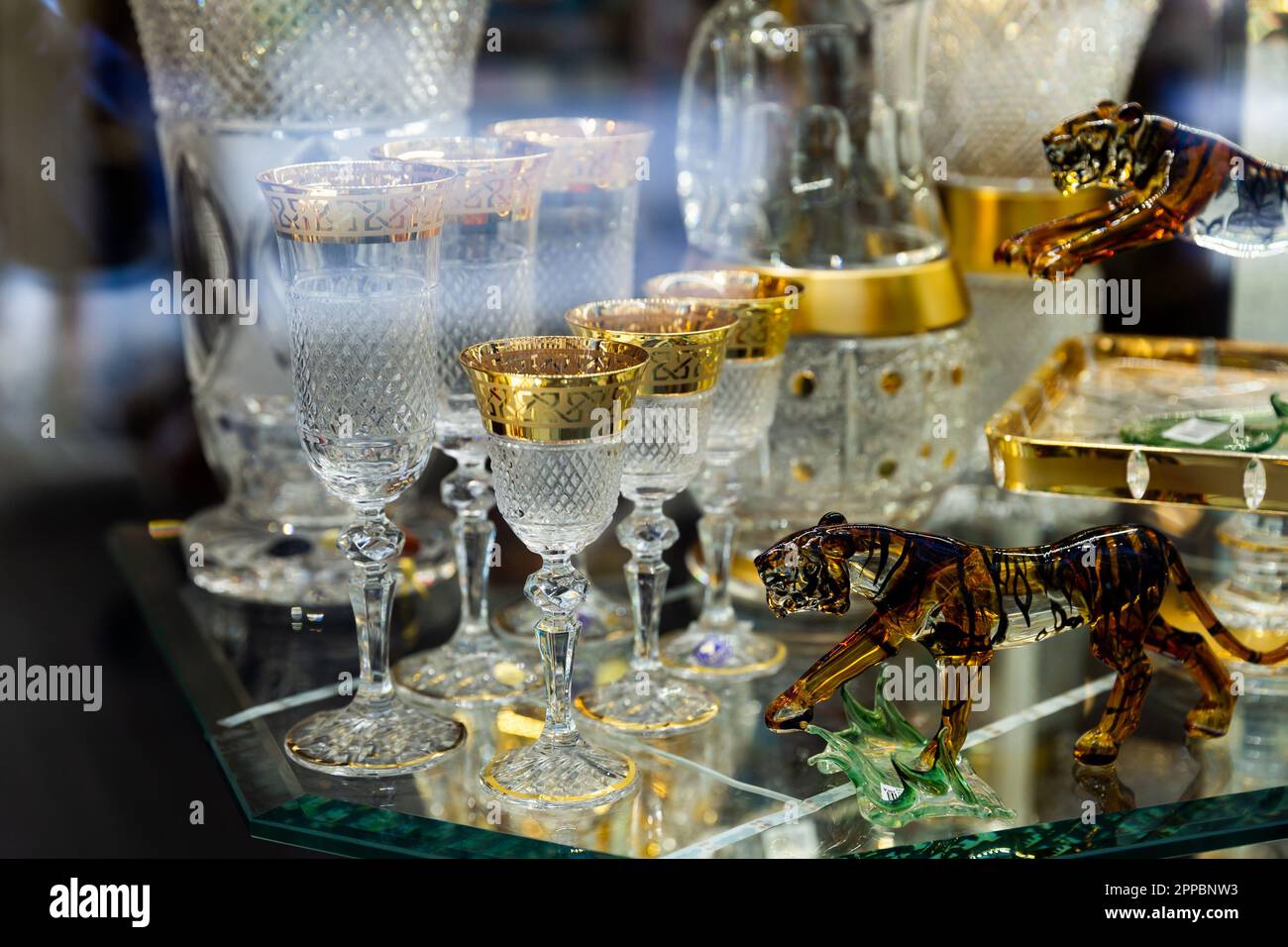 Bohemian glass figures and glassware on display of shop Stock Photo - Alamy