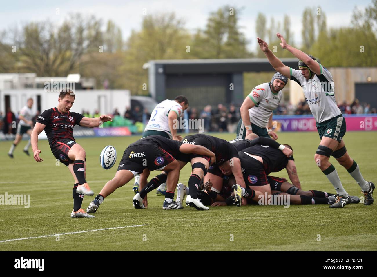 Ivan Van Zyl of Saracens kicks to clear during the Gallagher ...
