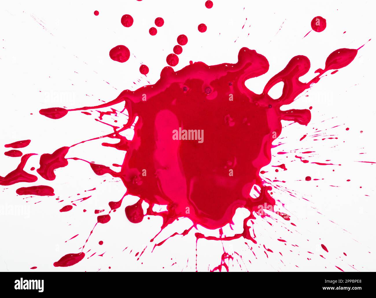 Red ink blot on white background Stock Photo - Alamy