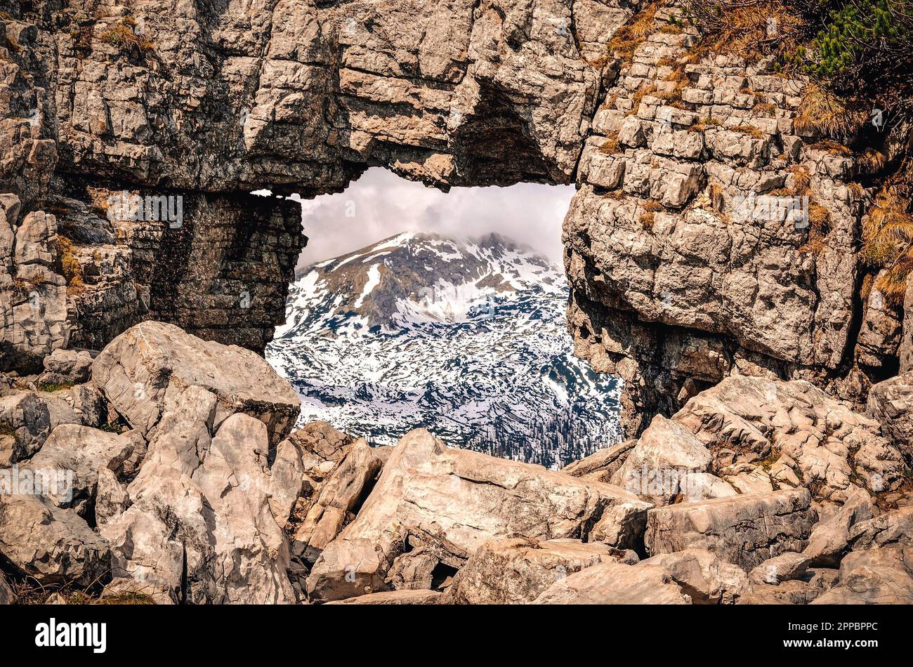 Interesting concept with a rock window overlooking the white snowy ...