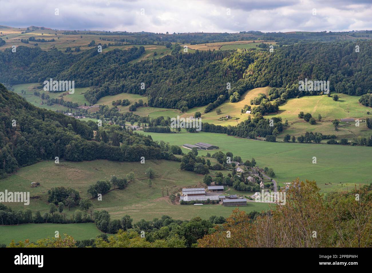 Country landscape in Auvergne, France with mountains, forests and ...