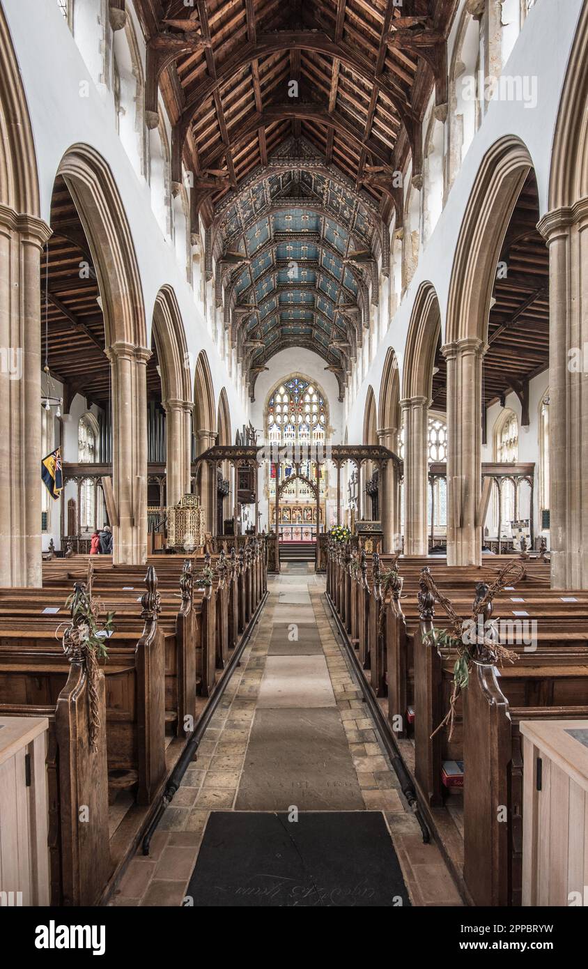 The east, stained glass windows (over the altar) & magnificent roof of ...