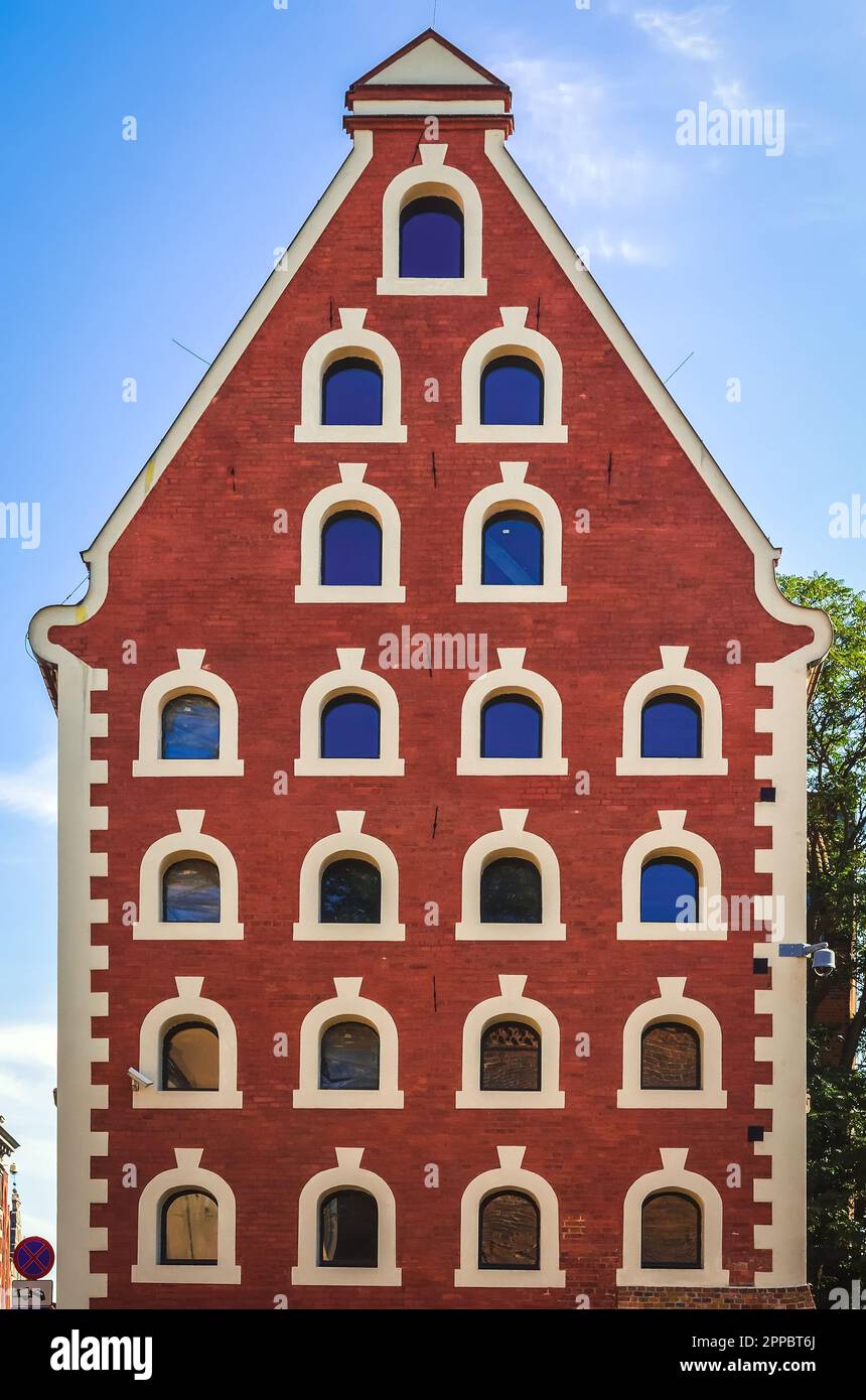 Old granary with decorative shutters in Torun, Poland. One of the ...