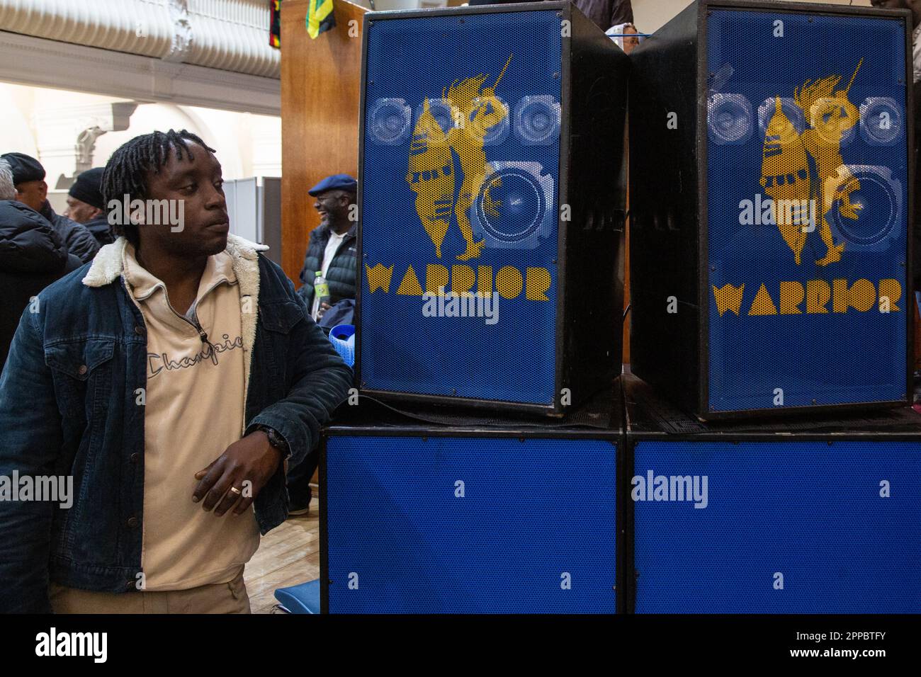 A man listens to speakers at Jah Shaka's Nine Nigh at the Great Hall ...