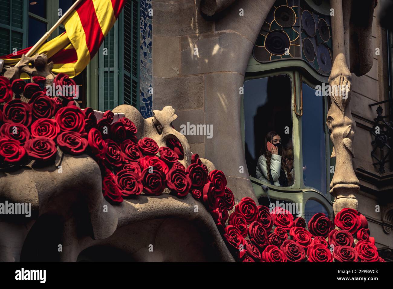 Barcelona, Catalonia, Spain. 23rd Apr, 2023. Tourists look out of the ...