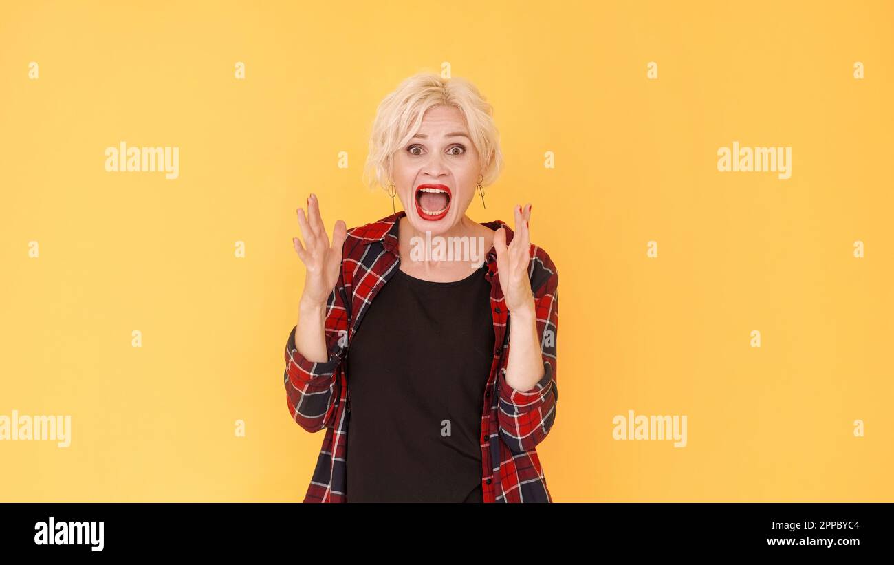Angry aged woman warning hi-res stock photography and images - Alamy