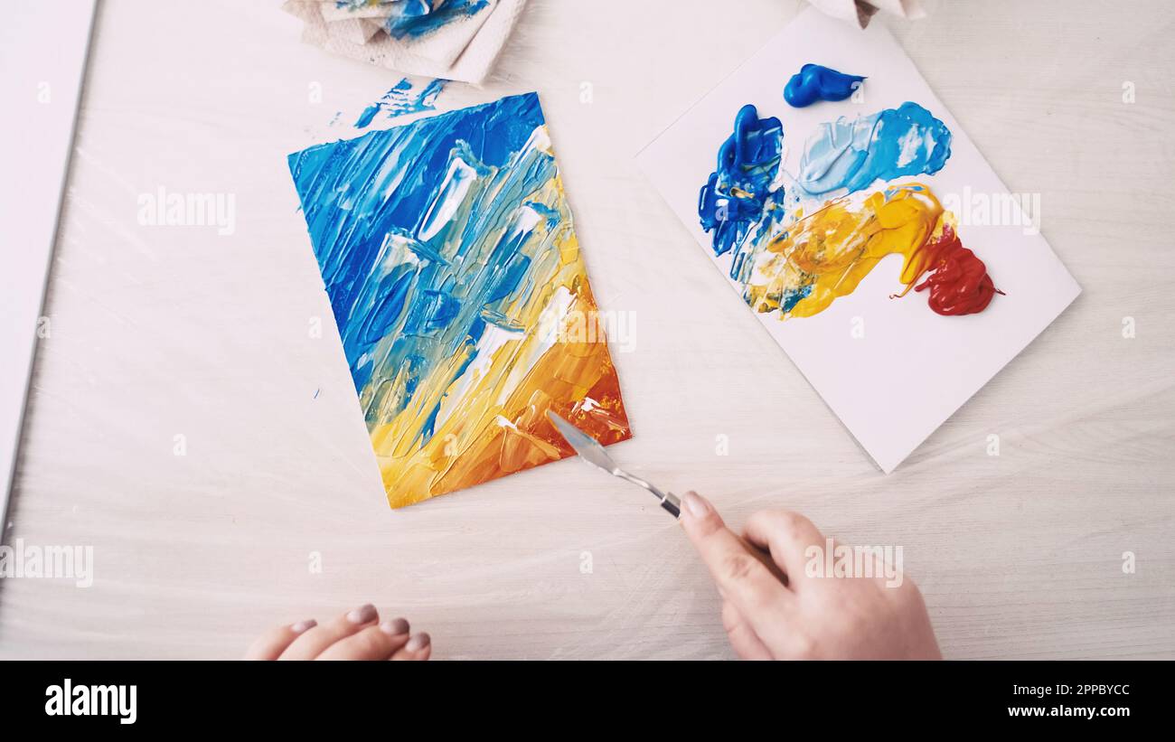 Top view female artist paints hi-res stock photography and images - Alamy