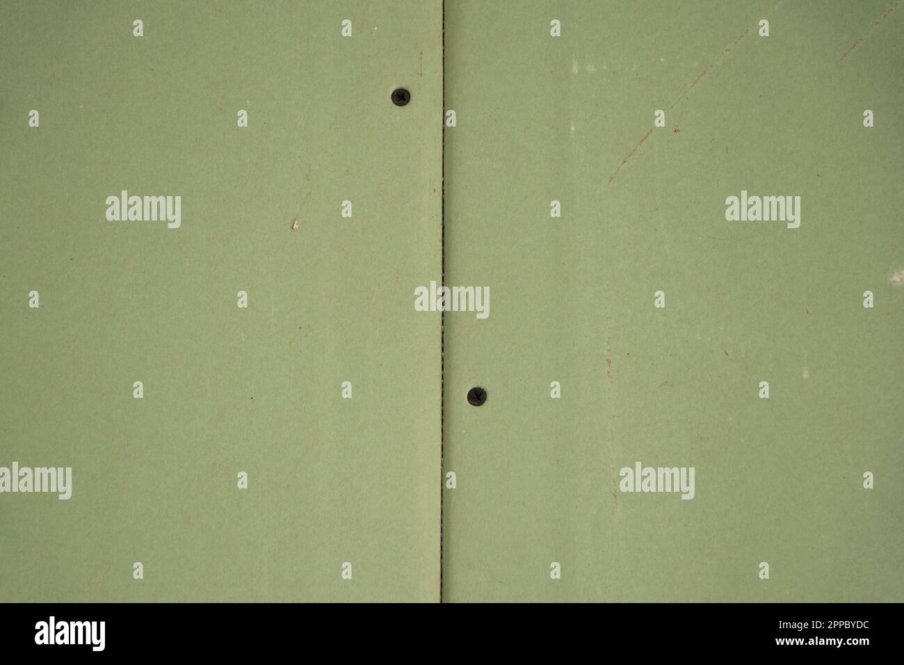 green drywall wall in the room during renovation, apartment renovation ...