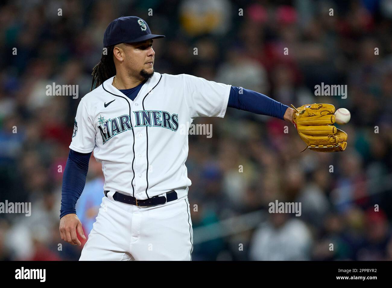 Seattle Mariners starting pitcher Luis Castillo catches the ball from ...