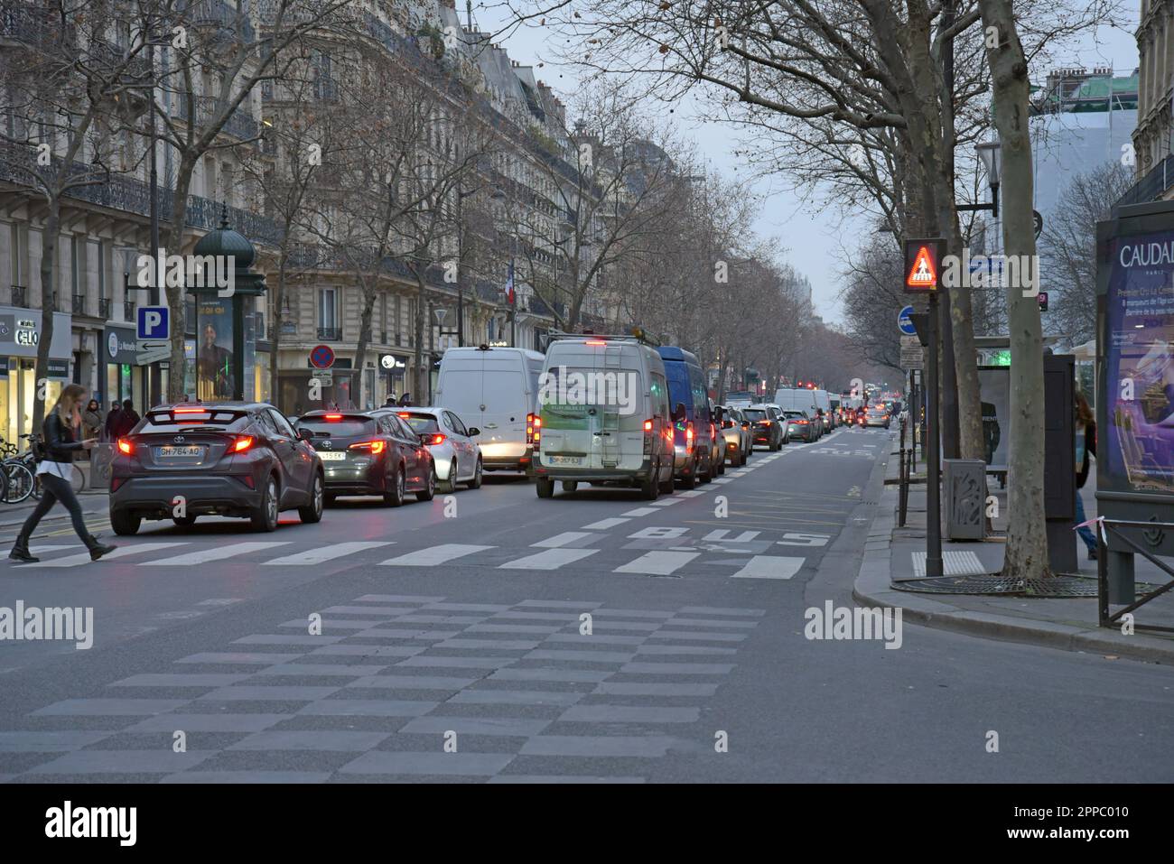 Cars queuing in rush hour traffic in Paris which recently started ...