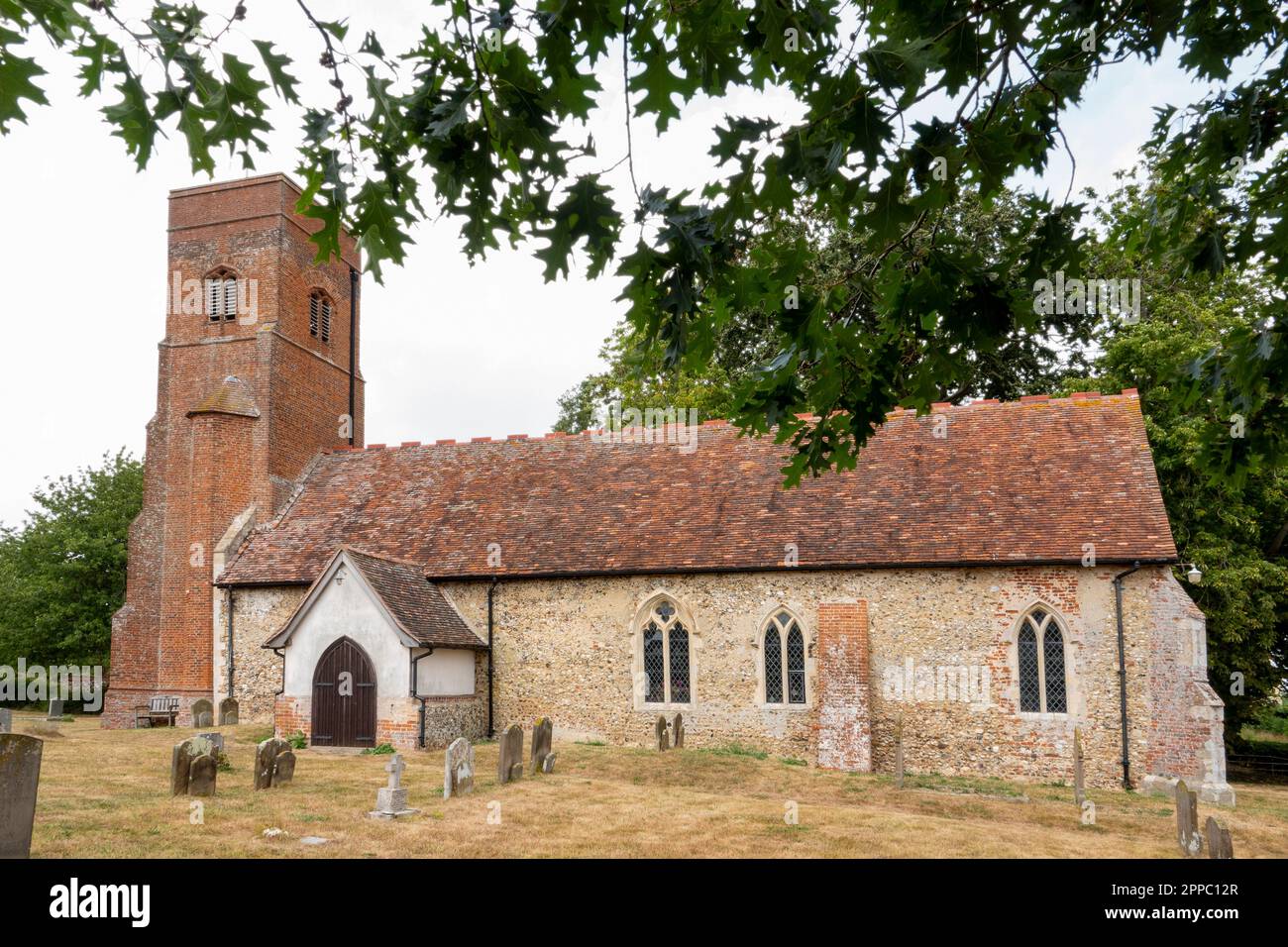The red brick tower and exterior of St Andrew and St Eustachius Church ...