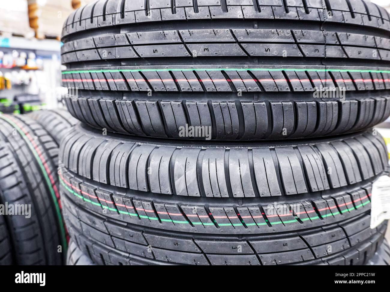 New summer tires stacked up for sale in a superstore Stock Photo - Alamy