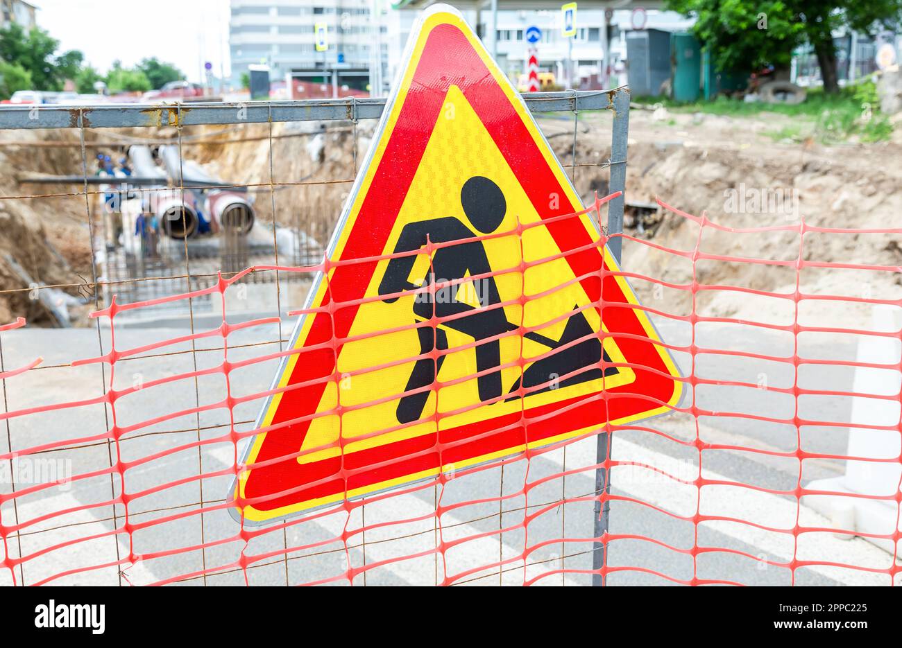 Road works sign at the city street. Carrying out construction and ...