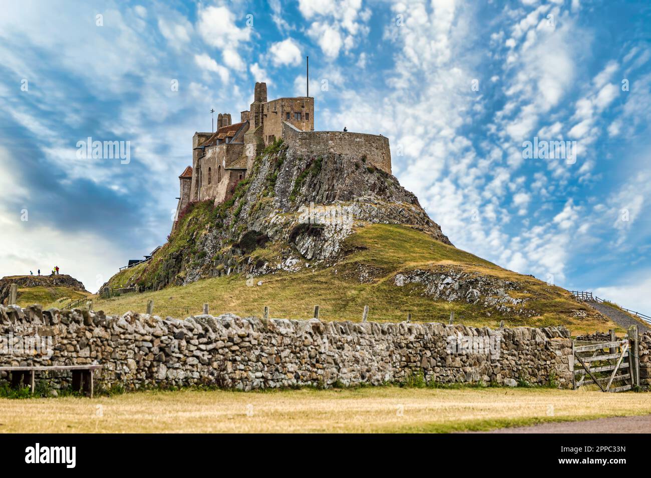 View of Lindisfarne Castle on hill, Holy Island of Lindisfarne ...