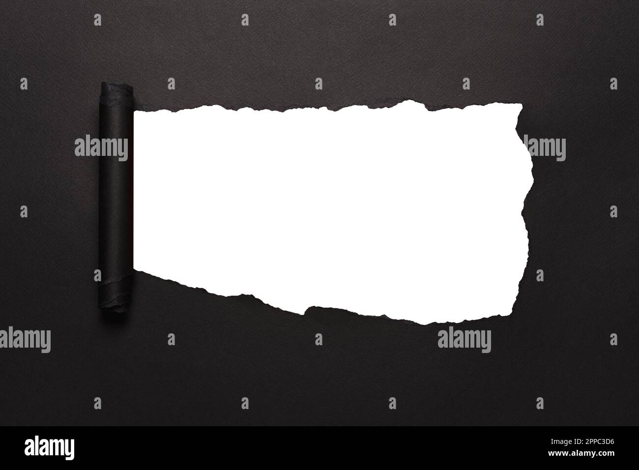 Torn hole and ripped of black paper on a transparent background with ...