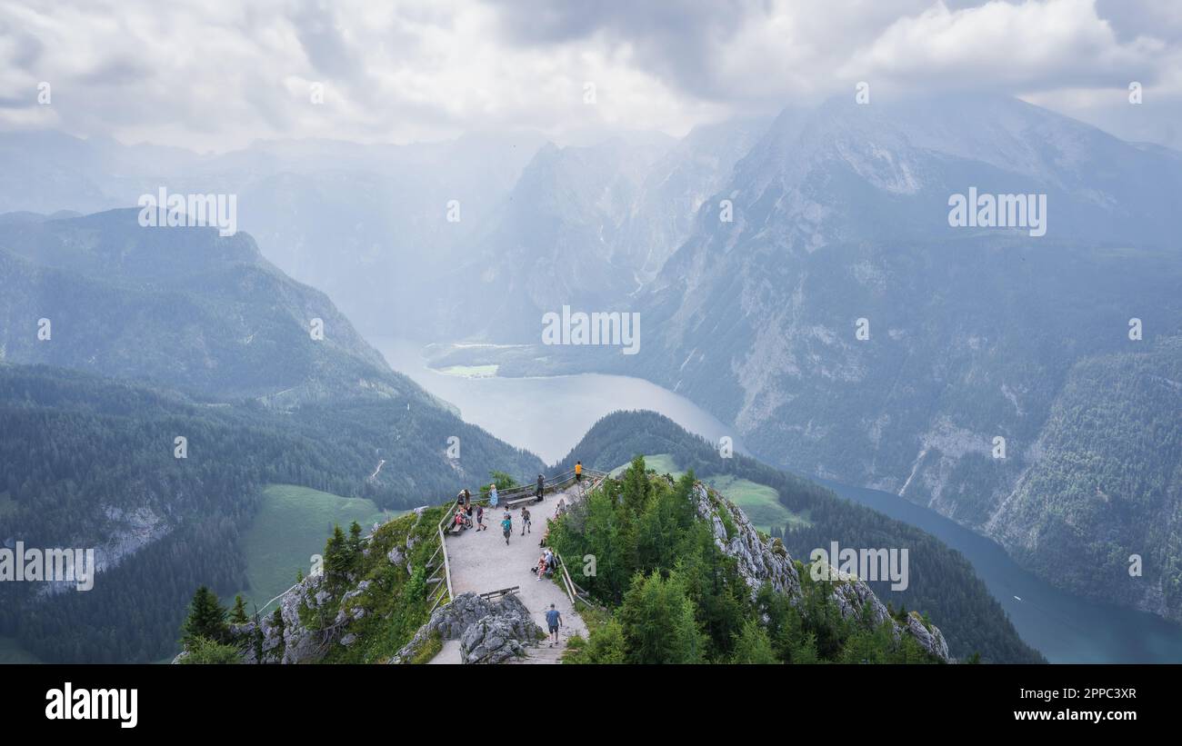 View on beautiful alpine valley with lake from high mountain summit ...