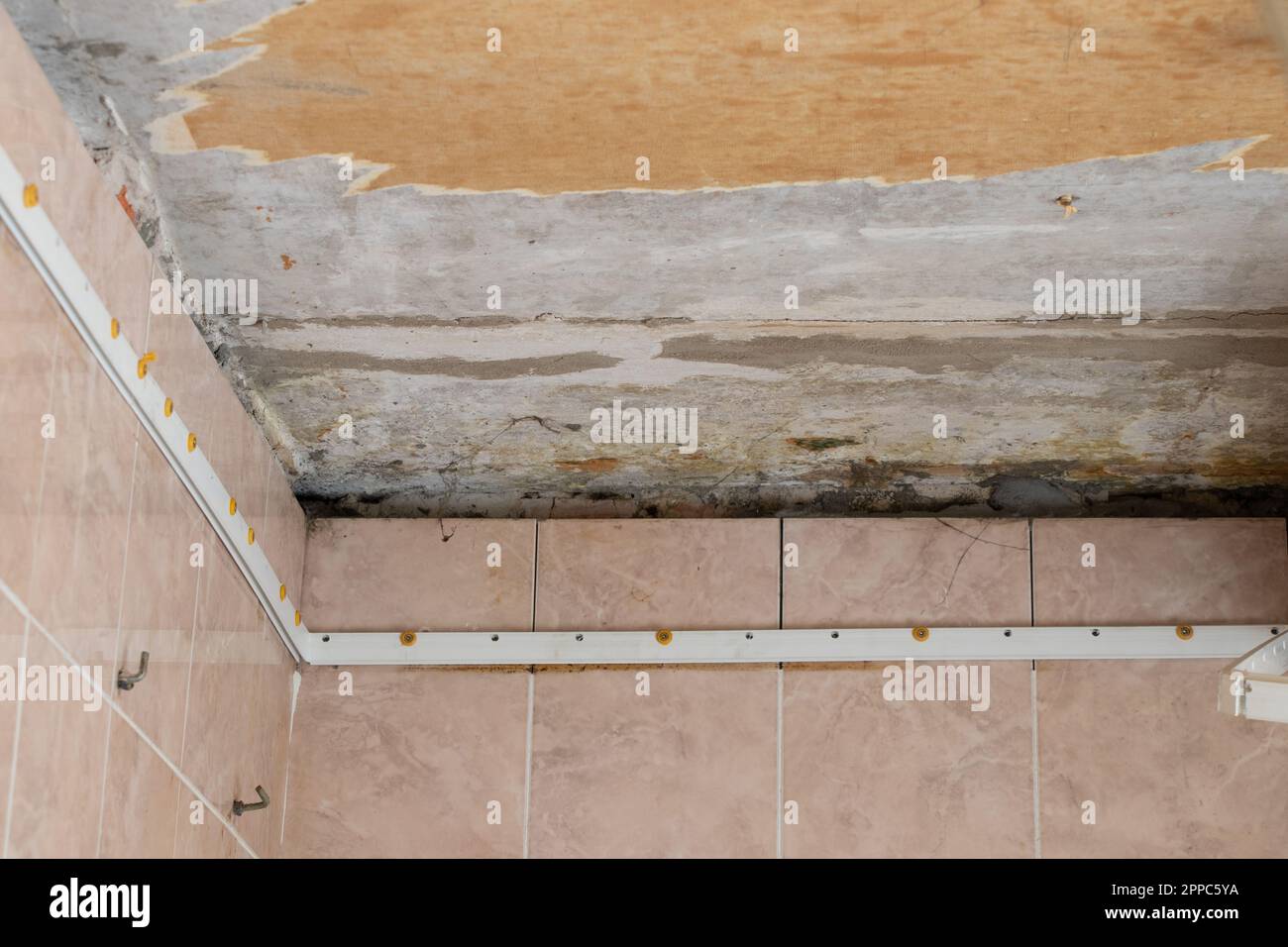 dismantling of the ceiling for renovation in the apartment, the old ...