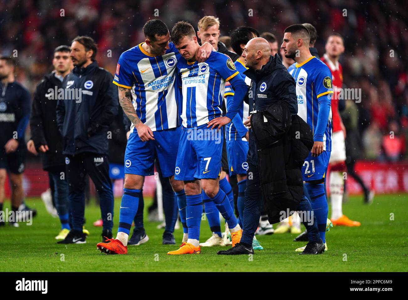 Brighton and Hove Albion's Lewis Dunk comforts Solly March after ...