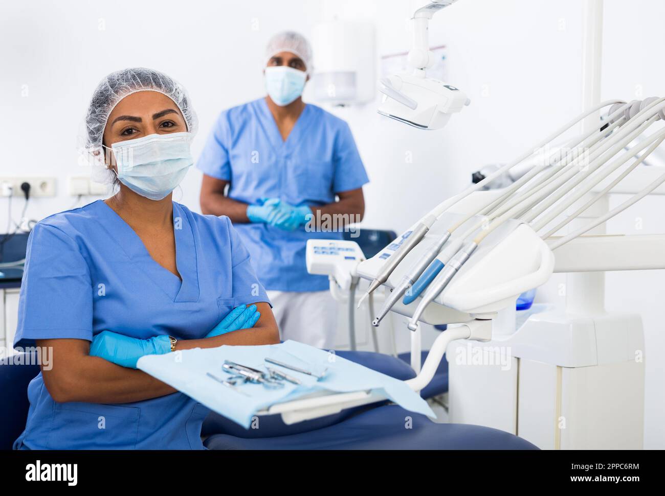 Professional woman dentist with arms crossed at dental clinic Stock ...