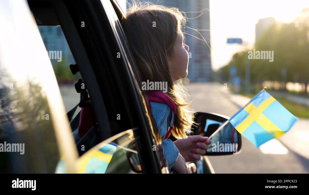 Pretty little girl in window with amazed face expression. Beautiful ...