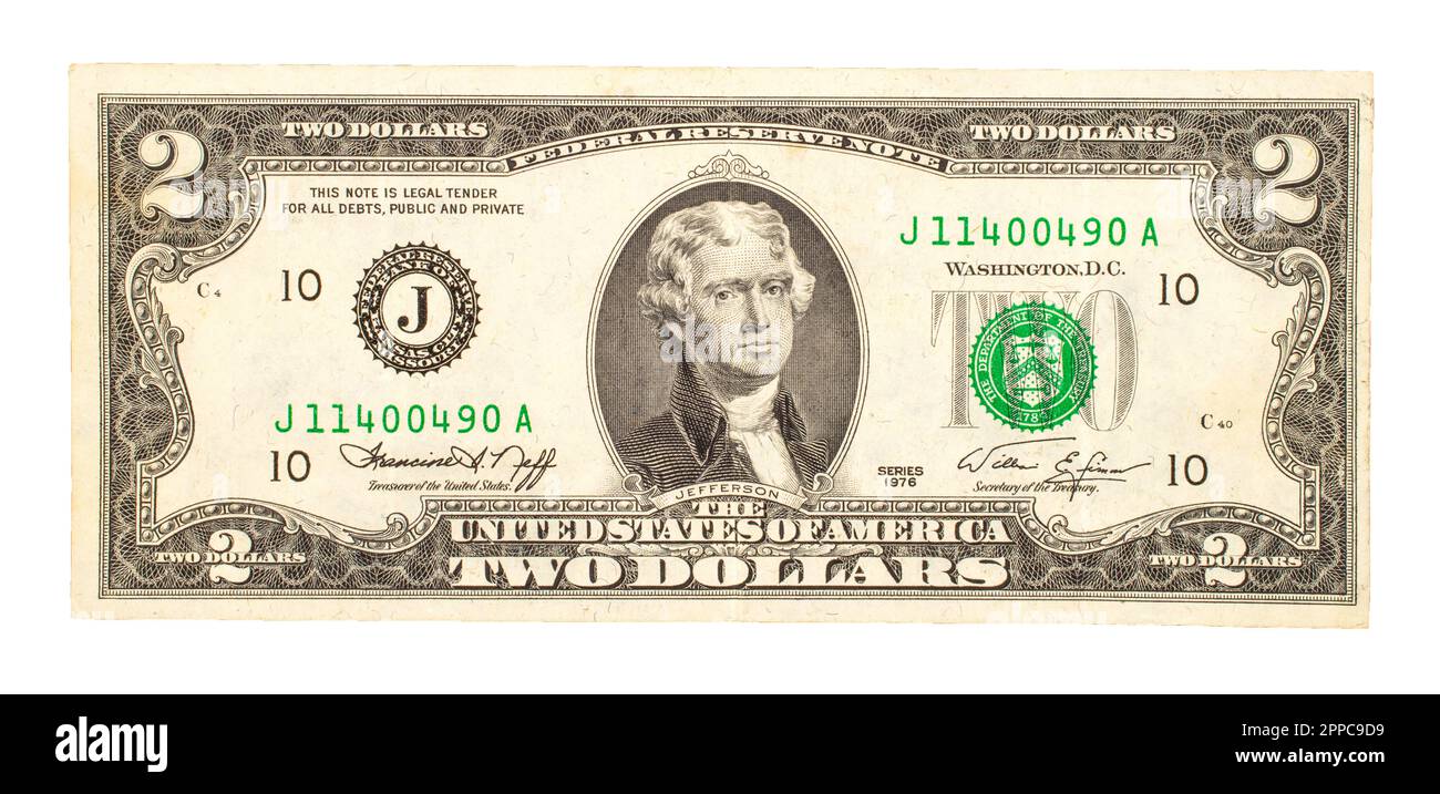 One paper old American two dollars isolated on white background, macro ...