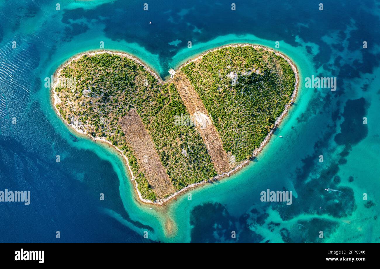 Aerial view of the heart shaped Galesnjak island on the adriatic coast, Zadar, Croatia. Heart ...