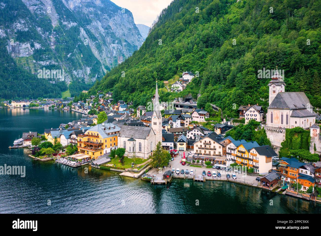 Aerial view of austrian mountain village Hallstatt and Hallstatter lake. Beautiful summer time ...