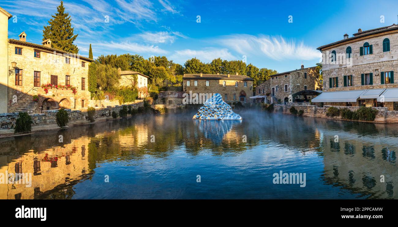 Thermal bath town of Bagno Vignoni, Italy during sunrise. Old thermal ...