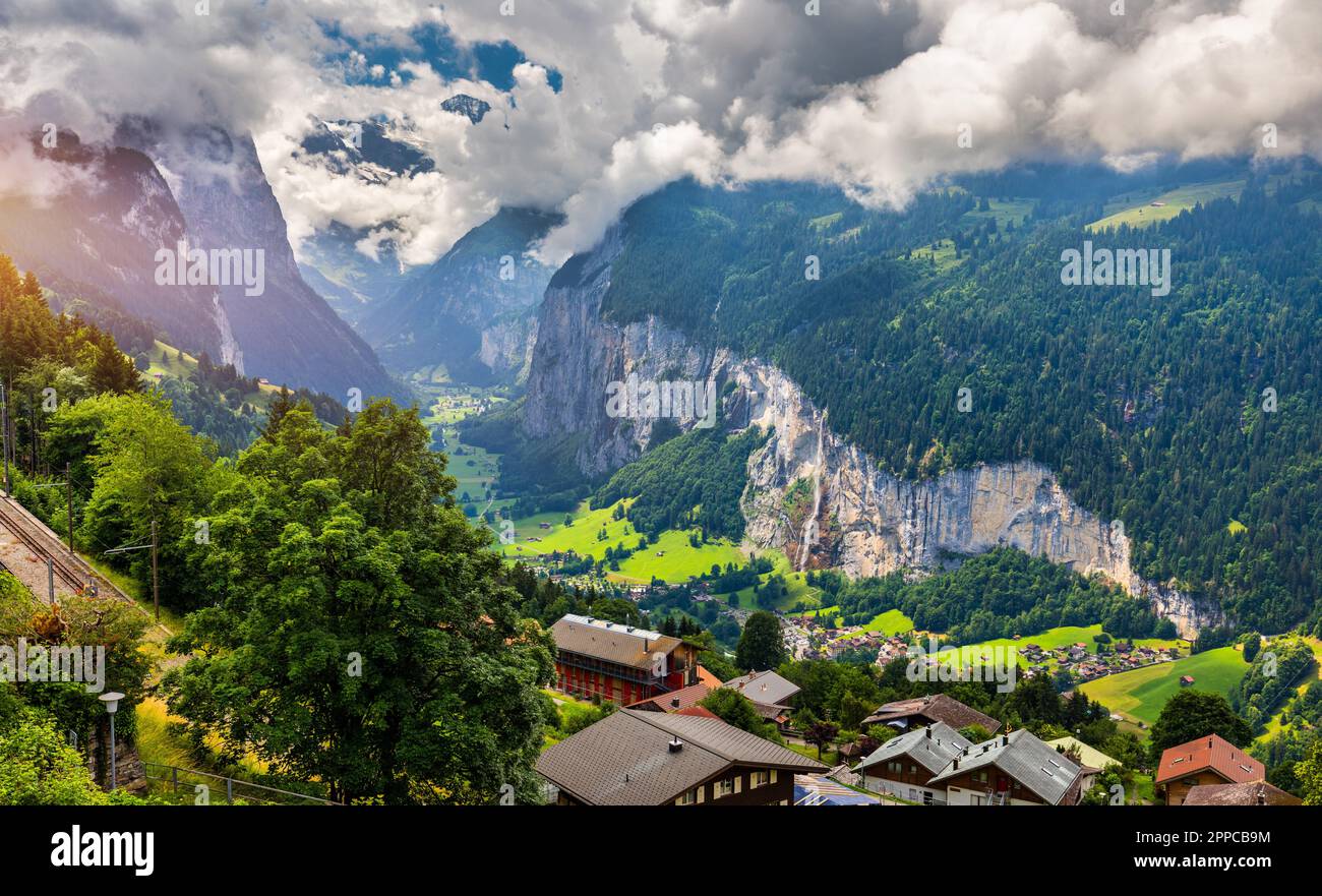Famous Lauterbrunnen town and Staubbach waterfall, Bernese Oberland ...