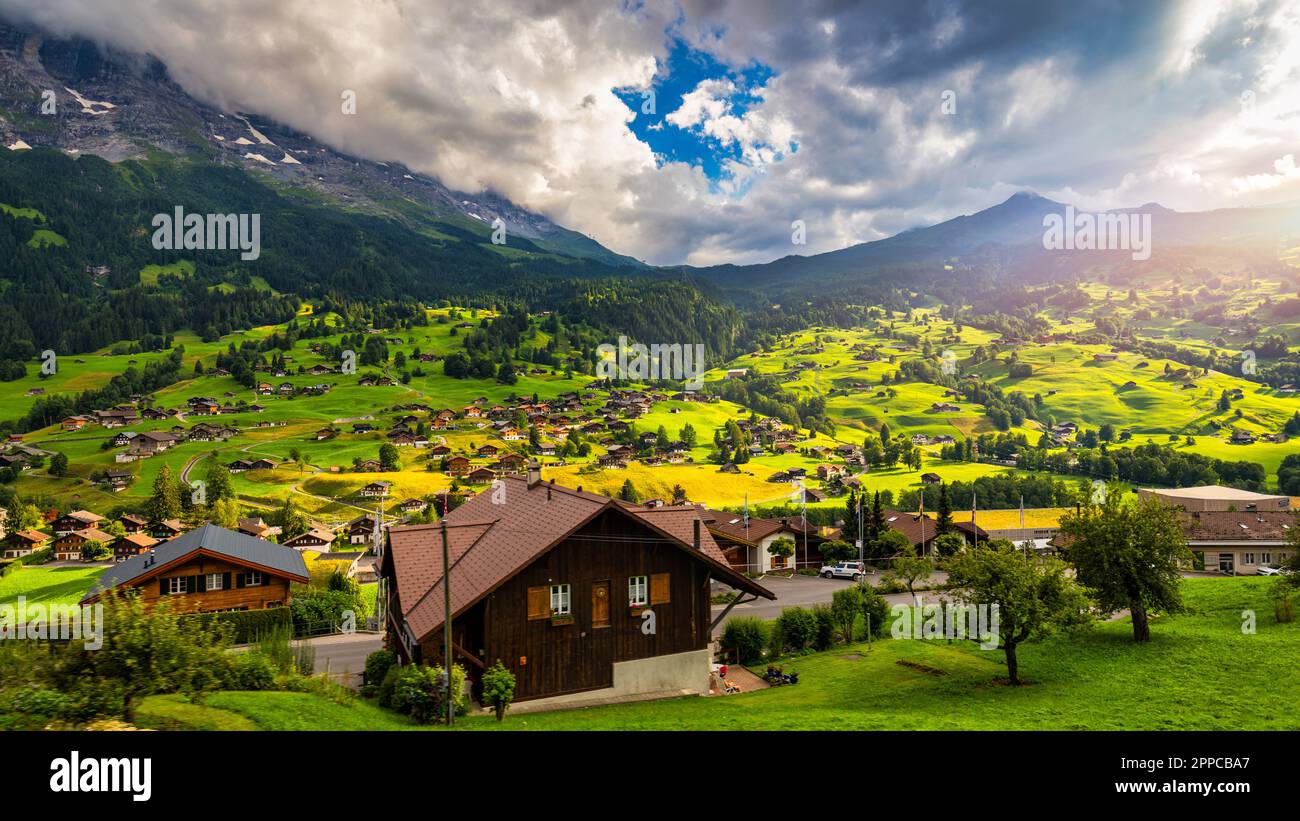 Grindelwald village view and summer Swiss Alps mountains panorama ...