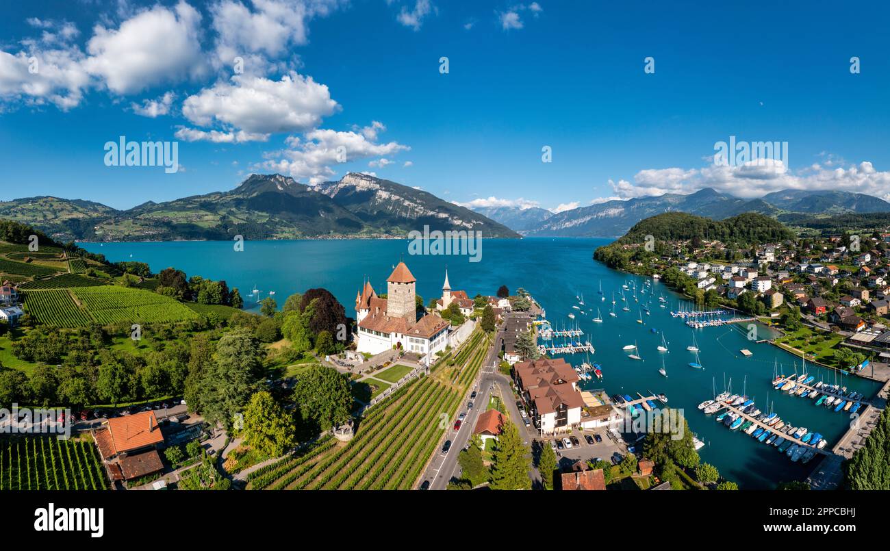 Aerial panoramic view of Spiez Church and Castle on the shore of Lake ...