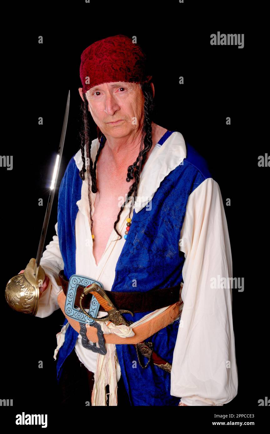 Pirate isolated on black with a cutless Stock Photo - Alamy