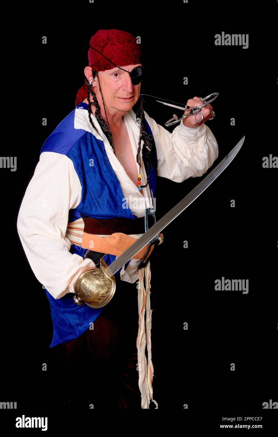 Pirate isolated on black with a cutless Stock Photo - Alamy
