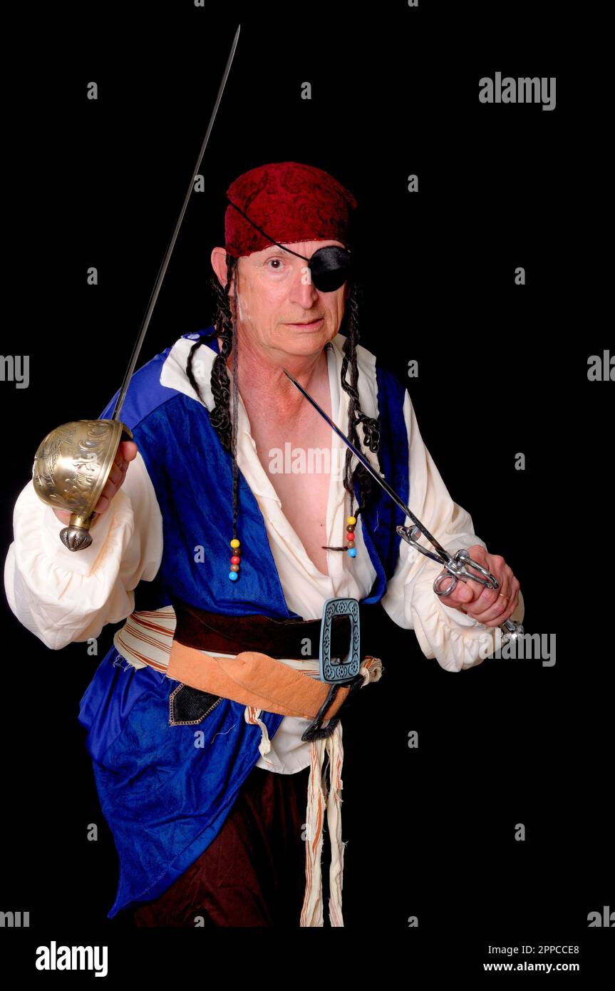 Pirate isolated on black with a cutless Stock Photo - Alamy
