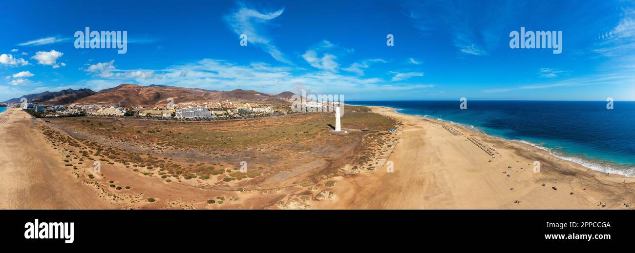 Lighthouse on Morro Jable beach on Jandia peninsula in sunrise light ...