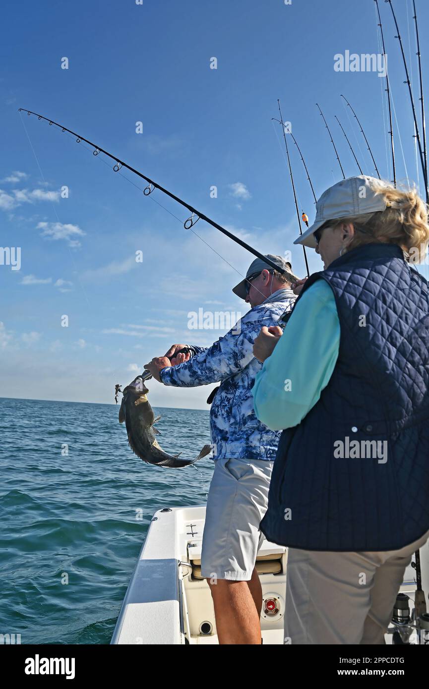 An angler can catch grouper in the shallow water flats around rock ...