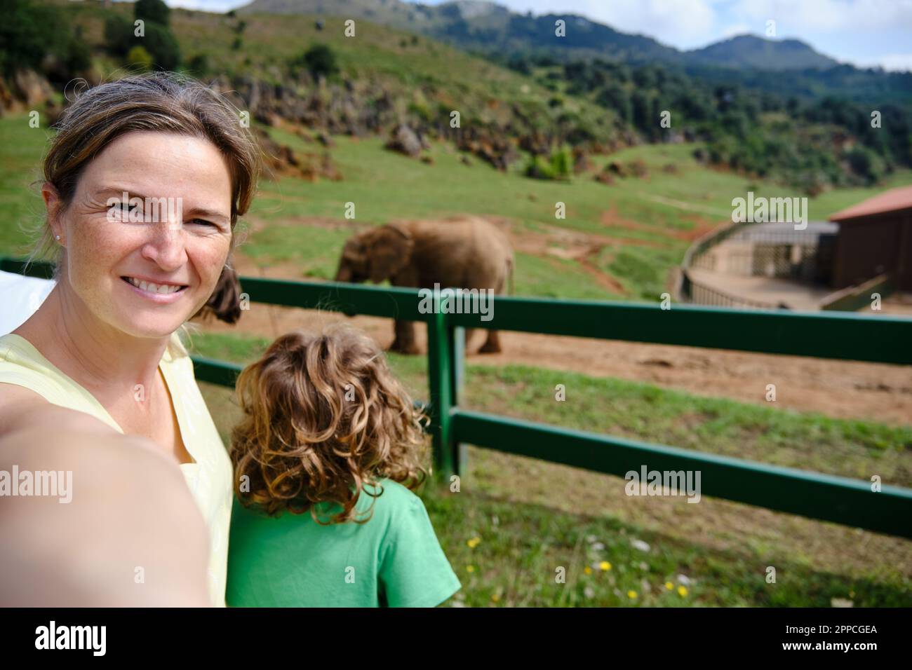 Mom and son having an unforgettable day at the zoo Stock Photo - Alamy