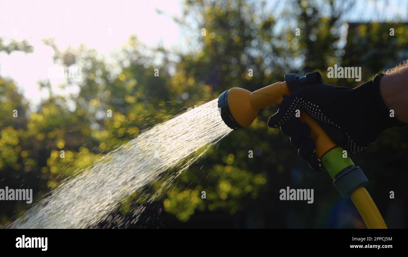 Water sprinkler spraying slow motion hi-res stock photography and ...