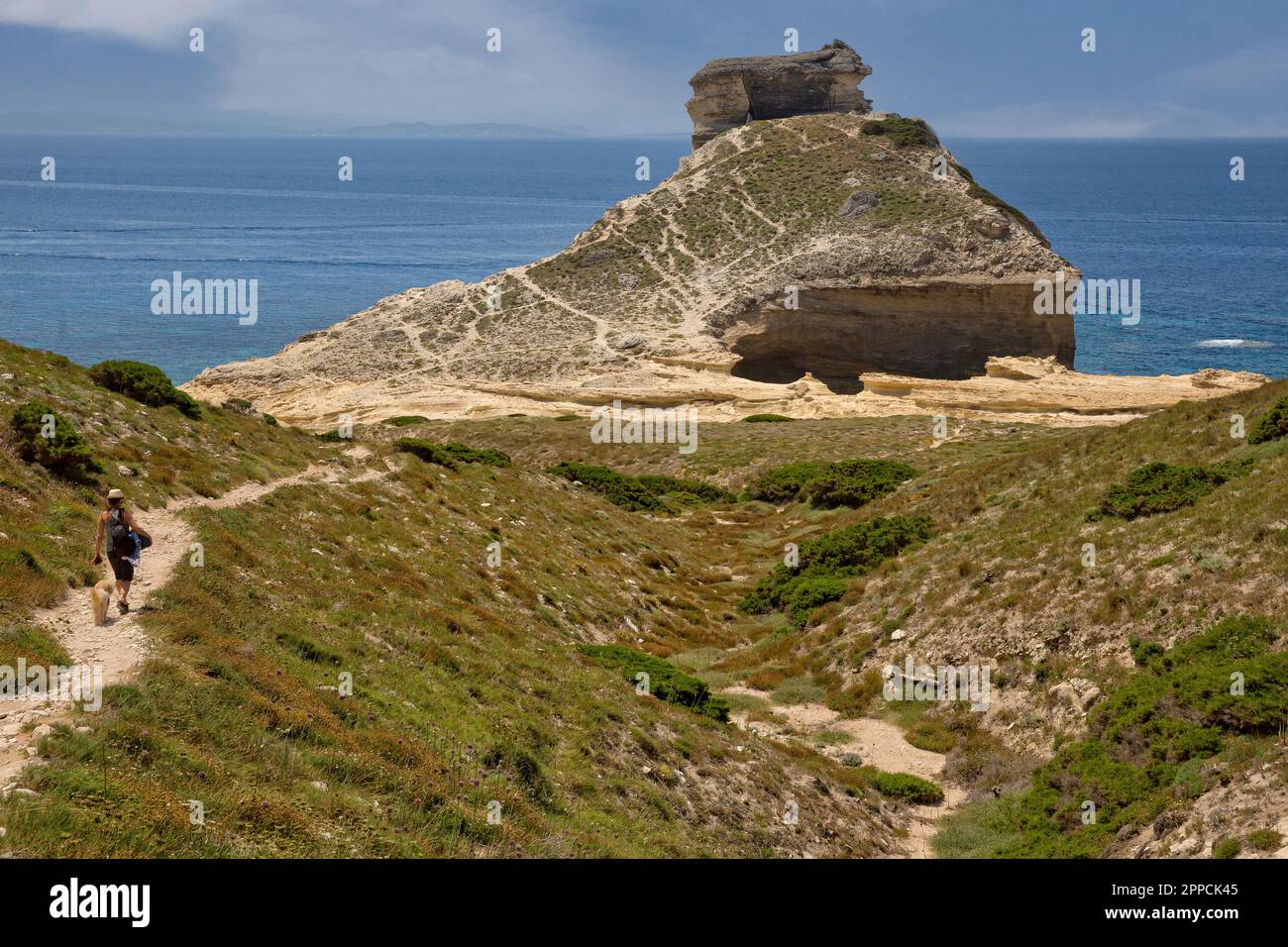 Hiking trail to the beautiful Saint Antoine beach with white cliffs and ...