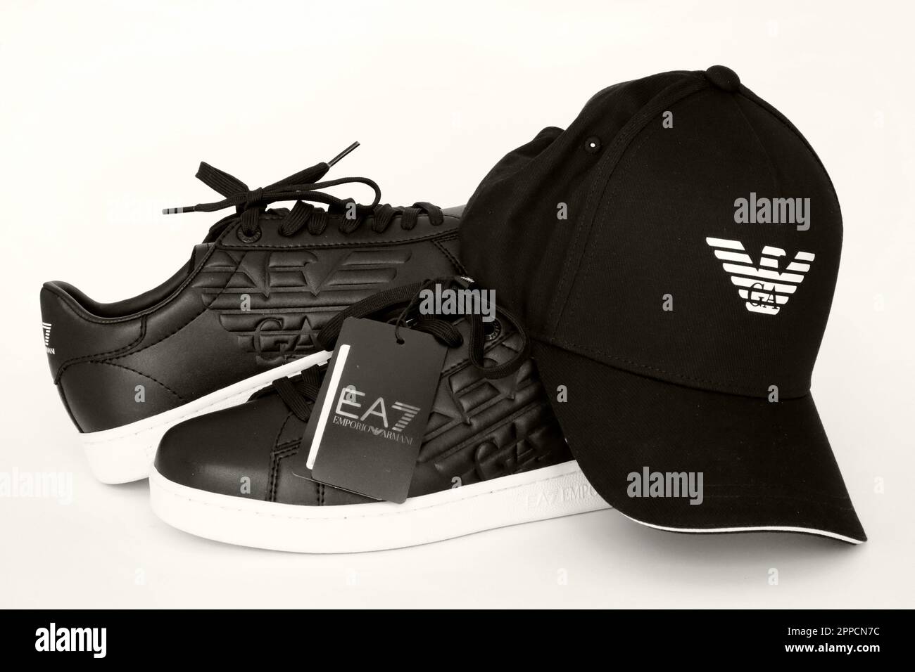 EA7 EMPORIO ARMANI Sneakers and Cap. EA7 is an Italian luxury fashion ...