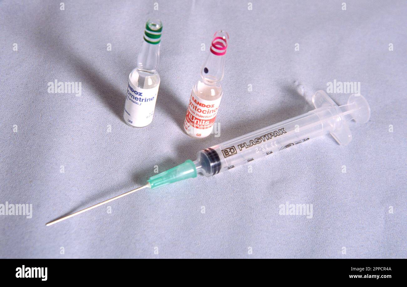 ergometrine and syntometrine solutions and syringe used post childbirth ...