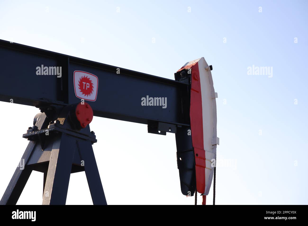 Hammer of Oil pumpjack with blue sky at the background Stock Photo - Alamy