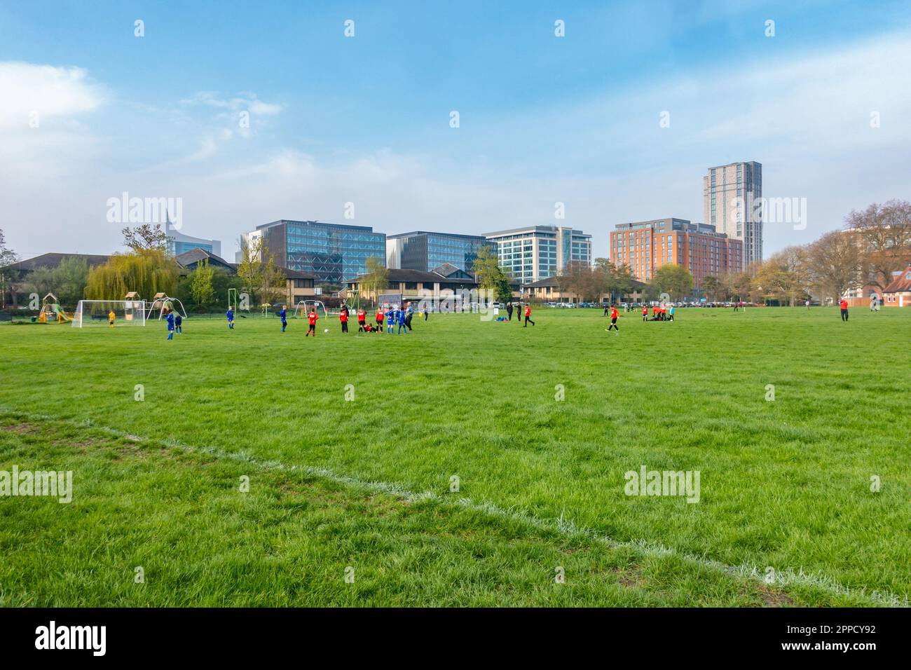 A children's game of football playing in Kings Meadow Park in Reading ...