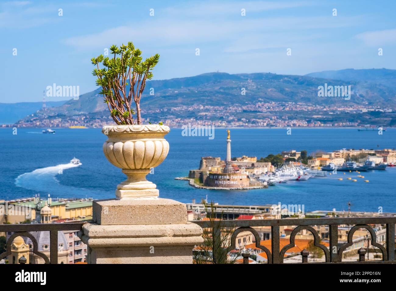 Italian balcony with plant in cement pot. Boat in Strait of Messina ...