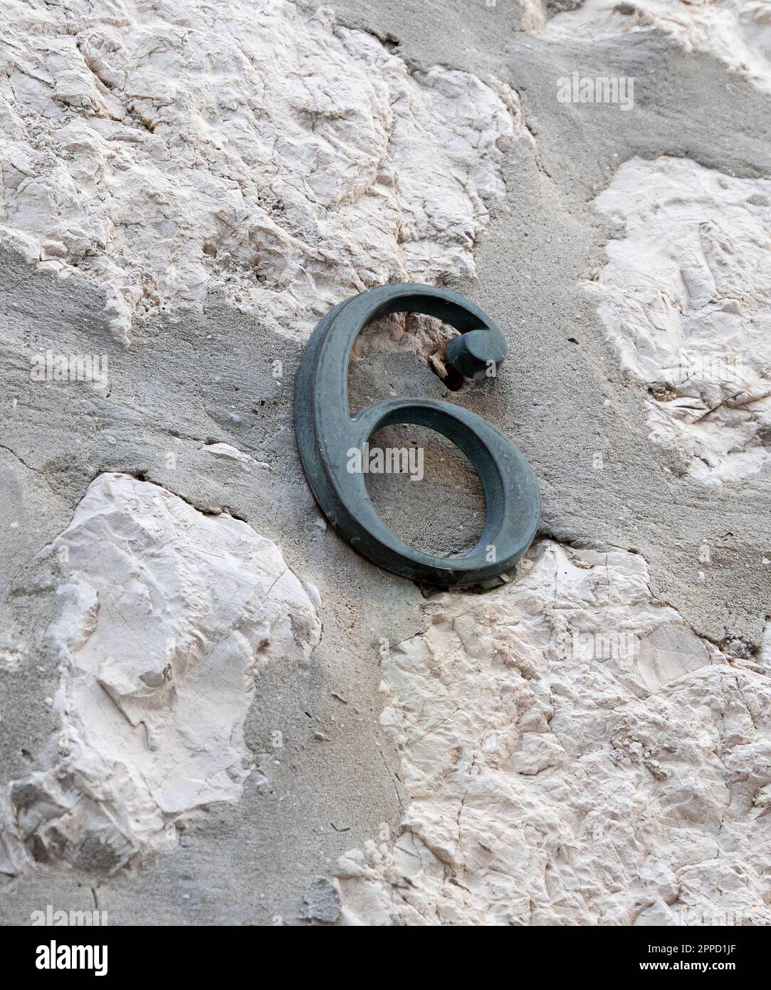 Rab, Croatia - August 24, 2022: A weathered stone wall on Rab Island in ...