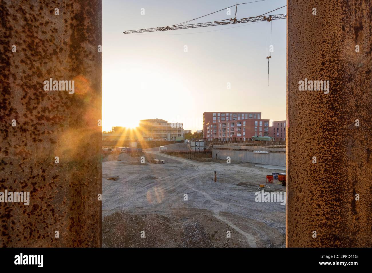 Empty under construction site at sunset Stock Photo - Alamy